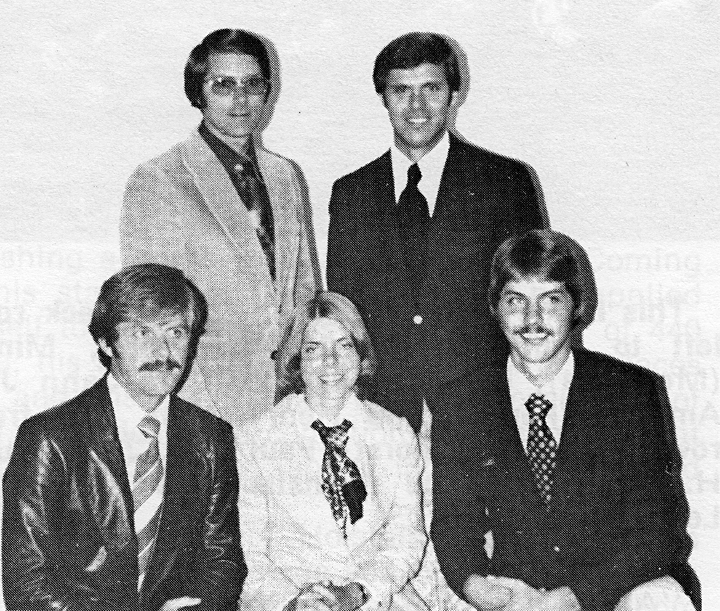 Randall and Dale standing, and Curt, Marilyn and Mark are shown in this ...